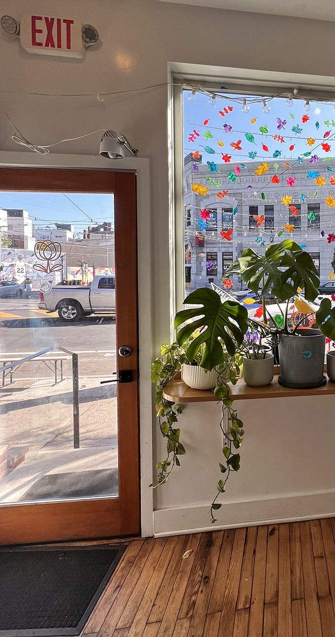 Even the exit is charming, with colorful paper flowers that make leaving feel like walking through a celebration rather than a goodbye.