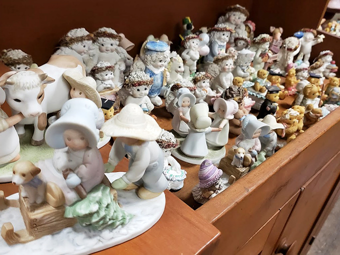 An army of porcelain figurines stands frozen in time, their permanently pleasant expressions suggesting they know something about life that we don't.