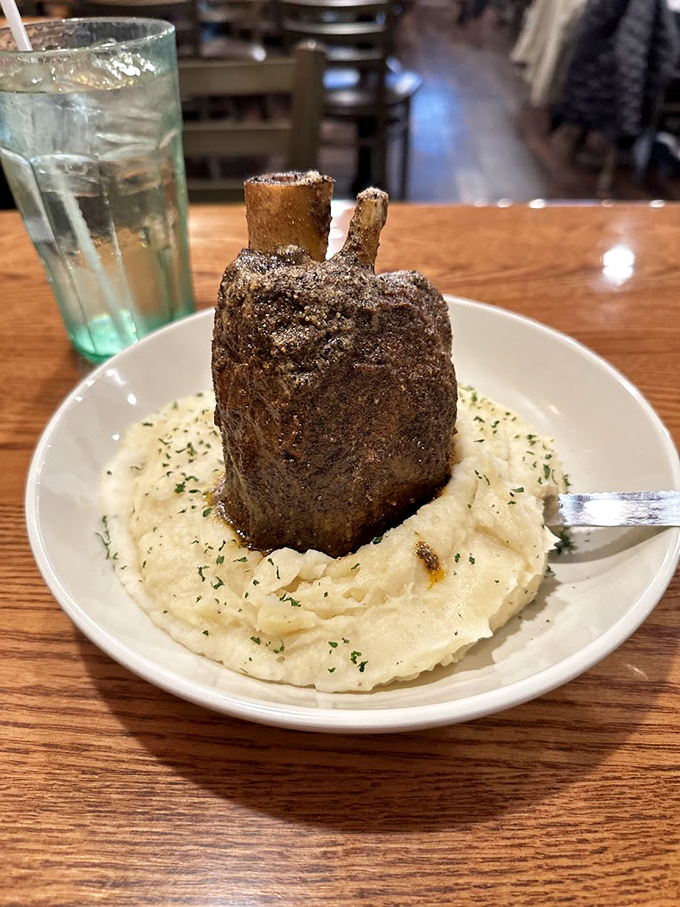 This filet mignon sits atop creamy mashed potatoes like a crown jewel of comfort food royalty.
