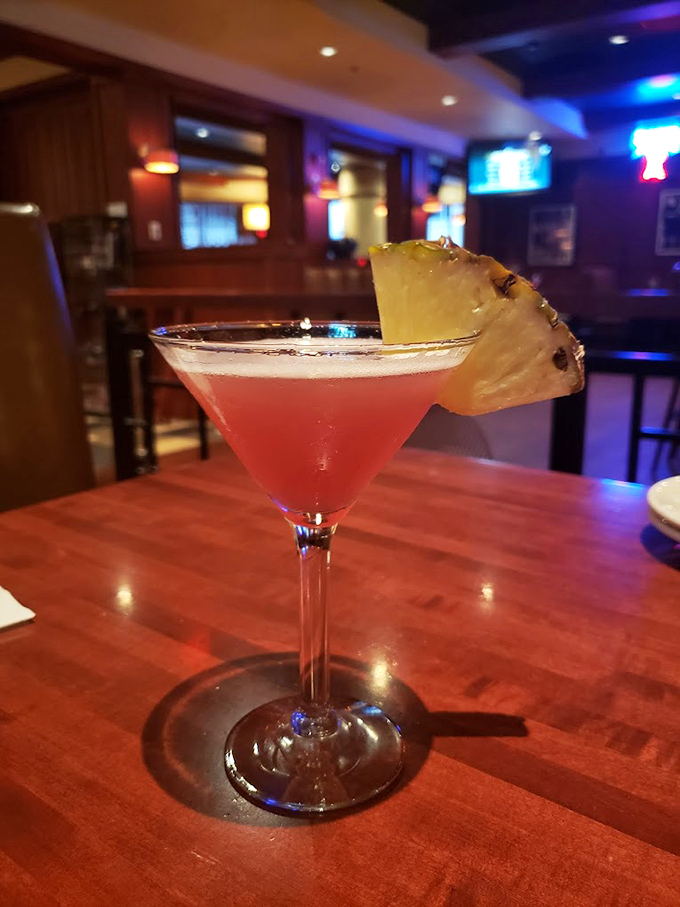 A cocktail that looks like a sunset in a glass, proving Weber knows how to play with fire in more ways than one.