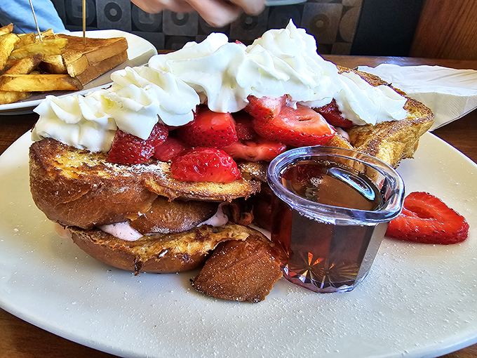 French toast transformed into a dessert-for-breakfast celebration, with strawberries, whipped cream, and enough joy to fuel your entire morning.