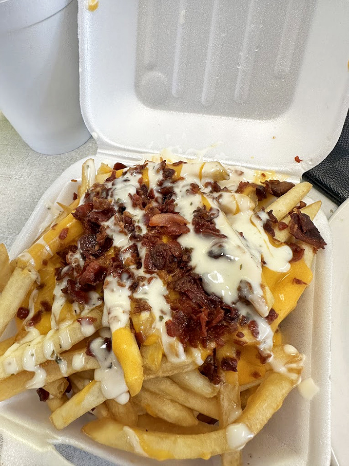 These aren't just cheese fries&mdash;they're a beautiful mess of melty cheese, bacon, and potato that demands to be devoured immediately.