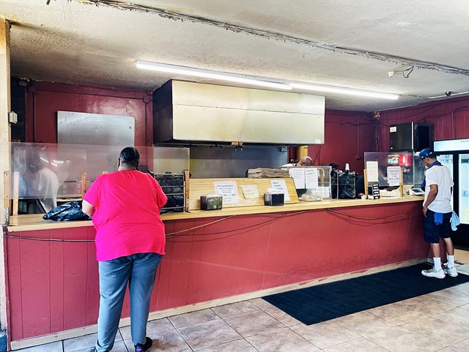 The ordering counter&mdash;where dreams are placed and smoky realities are returned. Notice the lack of pretense and abundance of efficiency.