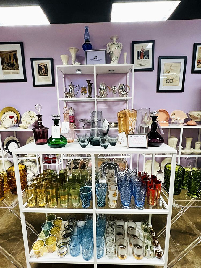 A lavender-walled paradise of vintage glassware where cocktail hour meets museum-quality collecting. Cheers to drinking with style!