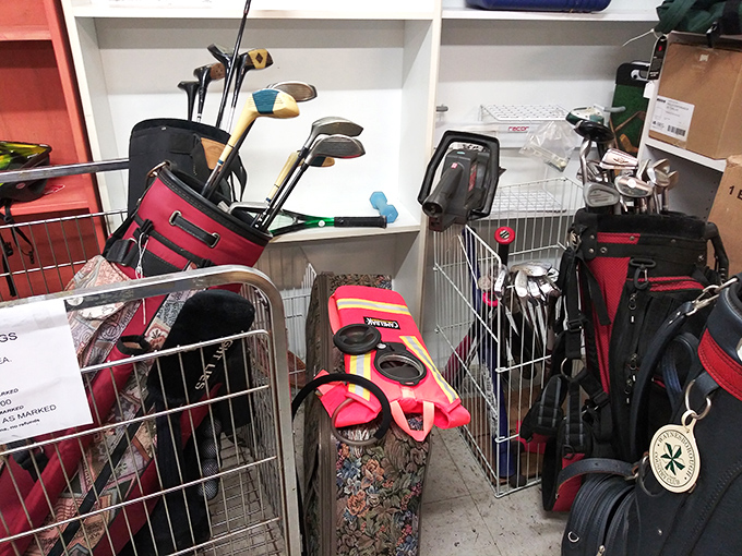 Golf club graveyard or budget golfer's paradise? These bags hold potential hole-in-one clubs for beach vacationers who forgot their equipment at home. 