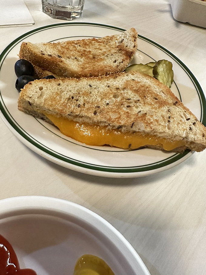 The grilled cheese that launched a thousand imitations. That golden-brown exterior hides a molten center that dreams are made of.