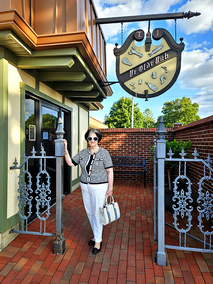 The entrance to Ye Olde Pub section welcomes guests through ornate ironwork gates&mdash;like passing through a portal to cocktail paradise.