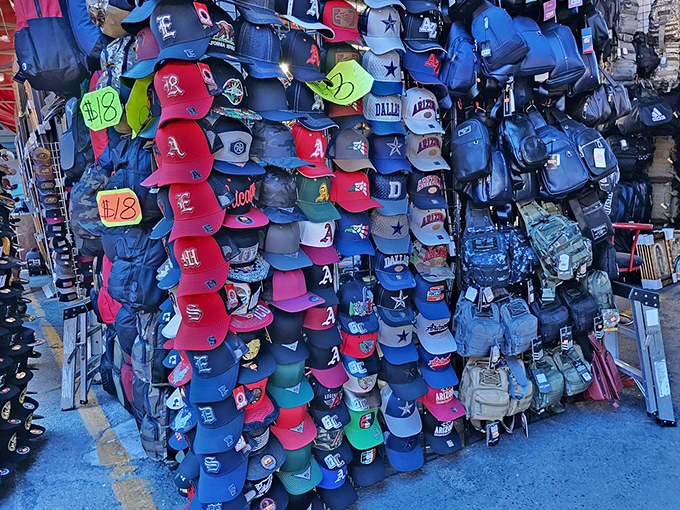 Team loyalty on display! Sports fans can find their perfect cap among this kaleidoscope of colors and logos. Baseball dreams at bargain prices.