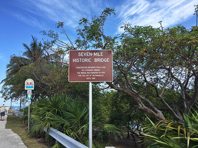 History stands sentinel at the bridge entrance, reminding visitors they're crossing more than water&mdash;they're traversing a century of Florida innovation.