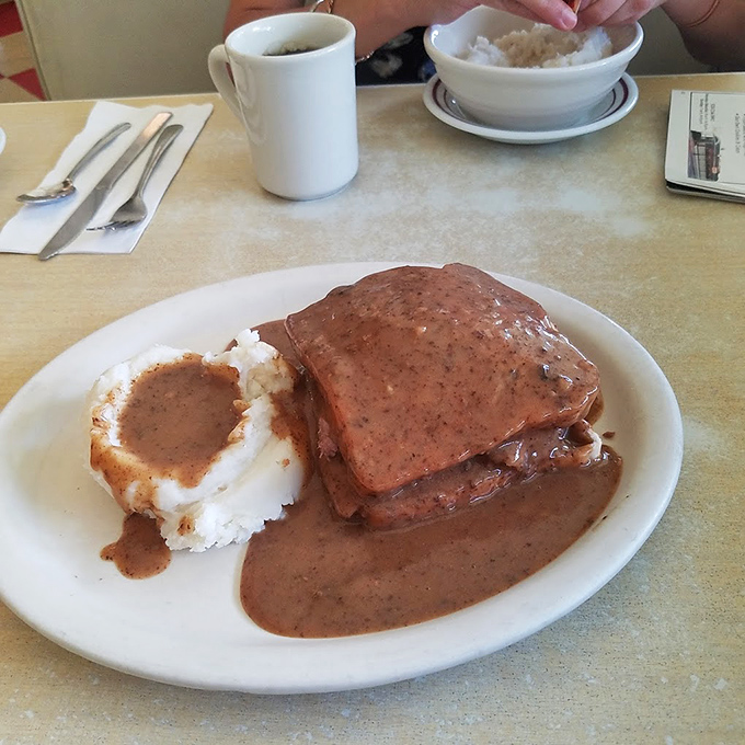 Hot roast beef swimming in gravy—the kind of meal that hugs you from the inside and makes you forget about that diet you were considering starting tomorrow.