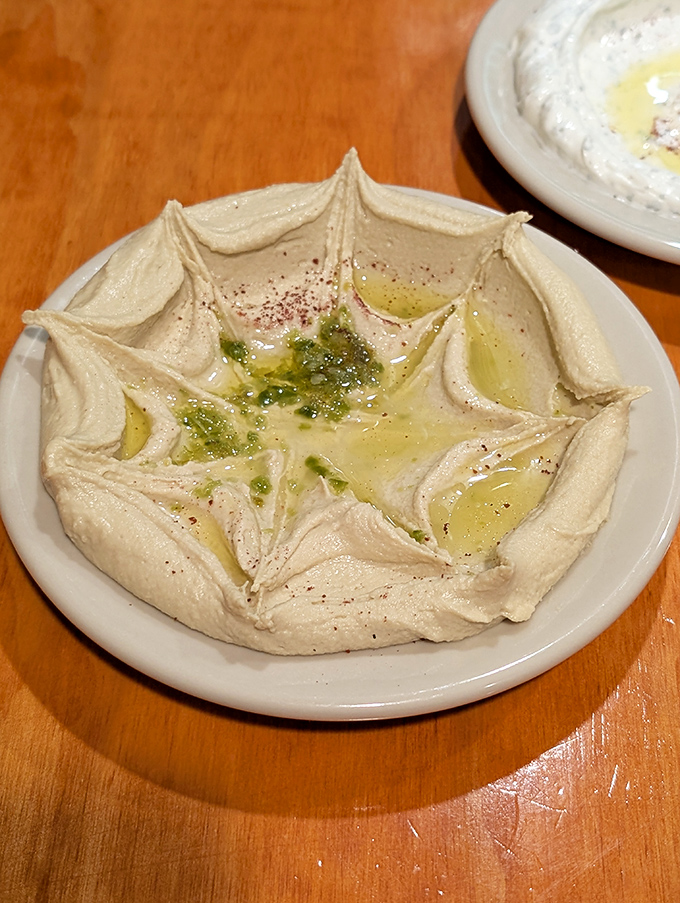 Hummus shouldn't just be a dip&mdash;it should be an experience. This artfully presented version, with its moat of olive oil, is ready for your bread-wielding invasion.