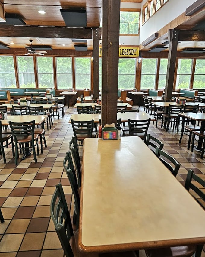 Sunlight streams through windows illuminating tables where memories are made, one perfect burger at a time.