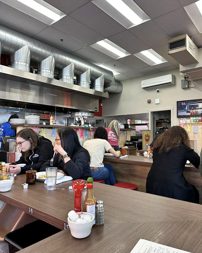 The open kitchen design isn't for show&mdash;it's so you can watch breakfast artisans at work while you contemplate a second cup of coffee.