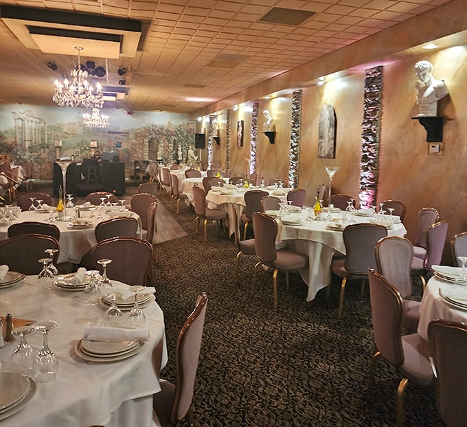 Elegant chandeliers cast a warm glow over the dining room, where every table feels like the best seat in the house.