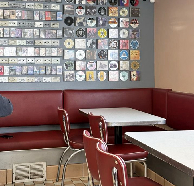 Red vinyl booths and classic diner lines create the perfect backdrop for conversations that flow as smoothly as the coffee refills.