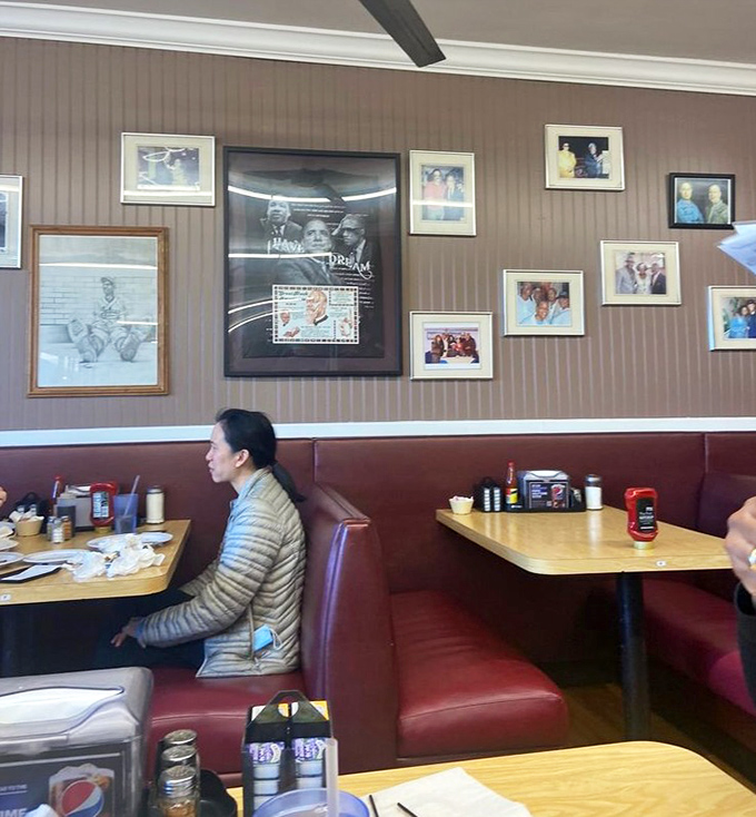 The wall of photos tells stories of community and history. In Inglewood, breakfast comes with a side of cultural significance.