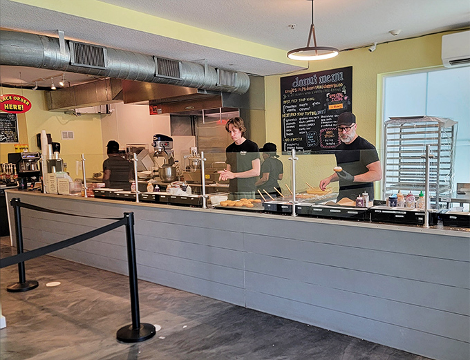The assembly line of donut dreams, where staff work with the precision of Swiss watchmakers but with far sweeter results.