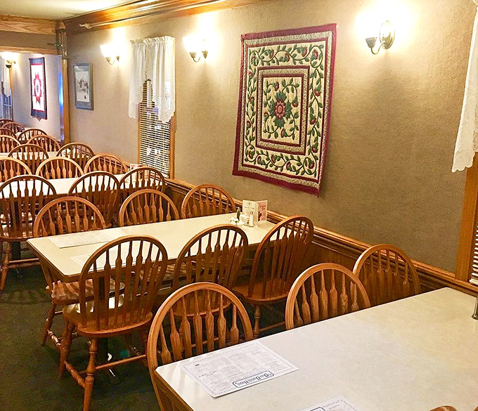 Another glimpse of dining room charm where simple wooden furniture creates unexpectedly elegant comfort.