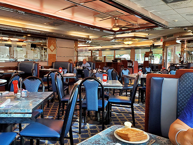 Blue chairs and wooden tables create the perfect backdrop for life's important moments&mdash;like deciding between pie or rice pudding for dessert. 