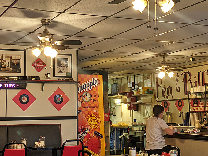 Ceiling fans lazily spinning above a room where conversations flow as freely as the coffee&mdash;diner ambiance you can't manufacture.