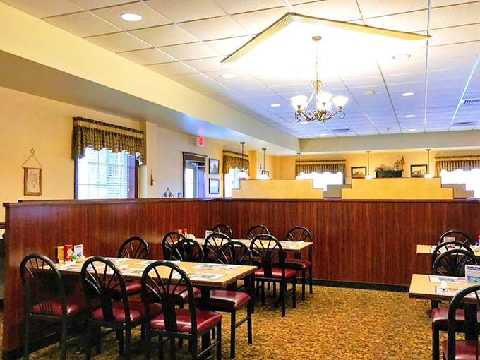 Another angle reveals booths and tables ready for the lunch rush that locals have been planning since breakfast.