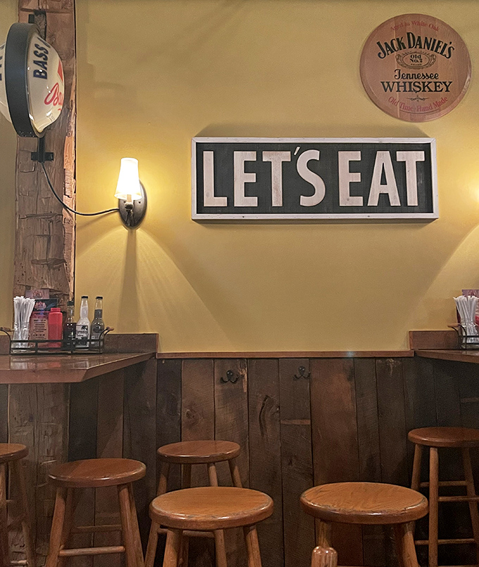 "Let's Eat" indeed – the most unnecessary sign ever posted in a barbecue joint, but somehow the perfect backdrop for meat-induced daydreams.
