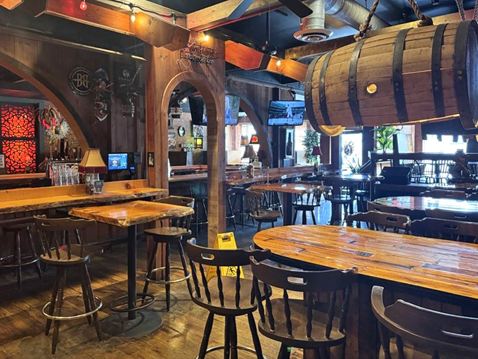 Wooden barrels and rustic tables create an atmosphere that feels both timeless and perfectly suited for modern-day pizza pilgrimages.