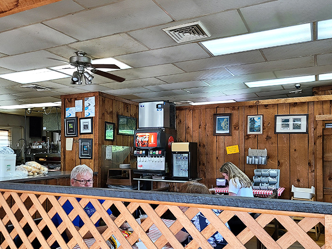 Another angle reveals more wood paneling and booths that have hosted countless lunch hours and life stories.
