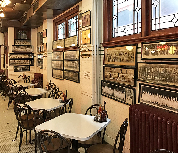 Historic photographs line walls that have witnessed countless satisfied customers discovering their new favorite seafood spot.