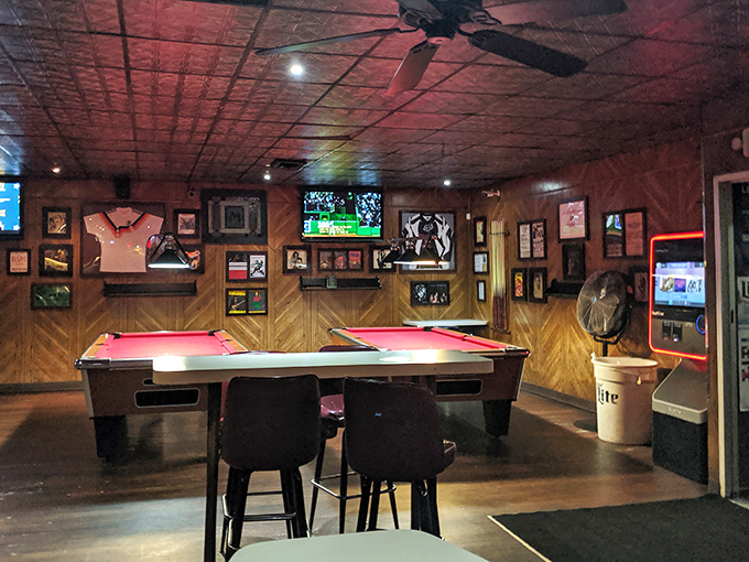 Pool tables, sports on TV, and walls covered in memorabilia &ndash; the classic trinity of a proper neighborhood hangout where everyone feels welcome.