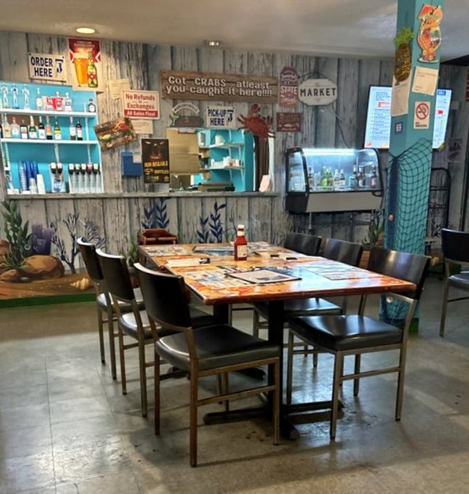 The counter area feels like the galley of a quirky fishing boat. That "Got Crabs" sign is exactly the kind of dad humor that makes this place endearing.