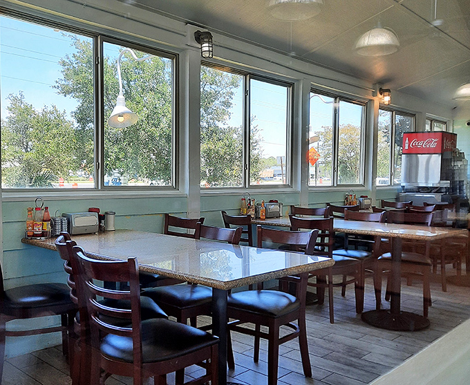 Sunlight streams through windows illuminating what might be the happiest room in Florida. Breakfast with a side of vitamin D.