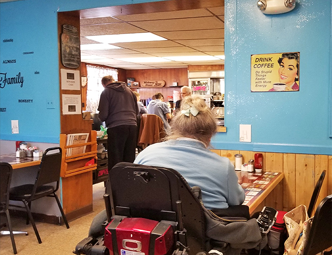 Blue walls that have absorbed decades of laughter and conversation. The Midway isn't just serving food—it's preserving a slice of American life.