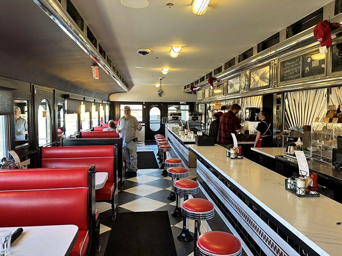 Classic diner design at its finest&mdash;where red booths meet chrome accents, and the counter stretches like a runway for plates of comfort food.