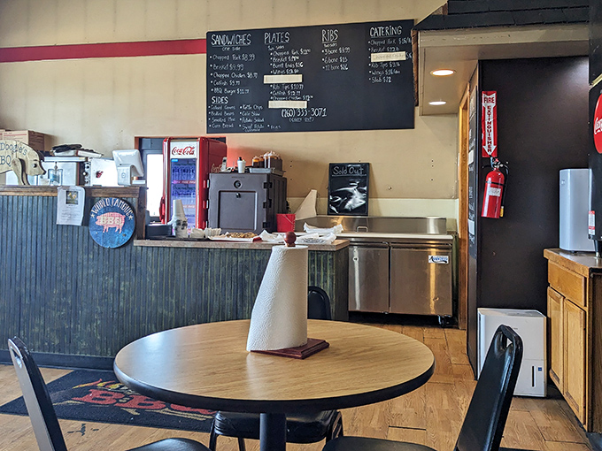 The industrial-chic interior proves you don't need fancy decor when your smoker does the heavy lifting.