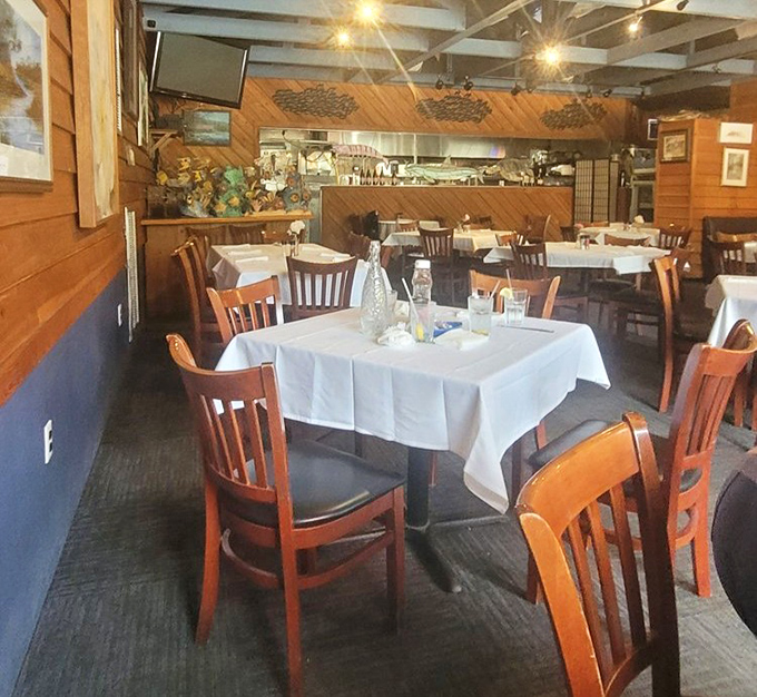 White tablecloths meet wooden paneling in this dining room where seafood gets the respect it deserves without any unnecessary fussiness.