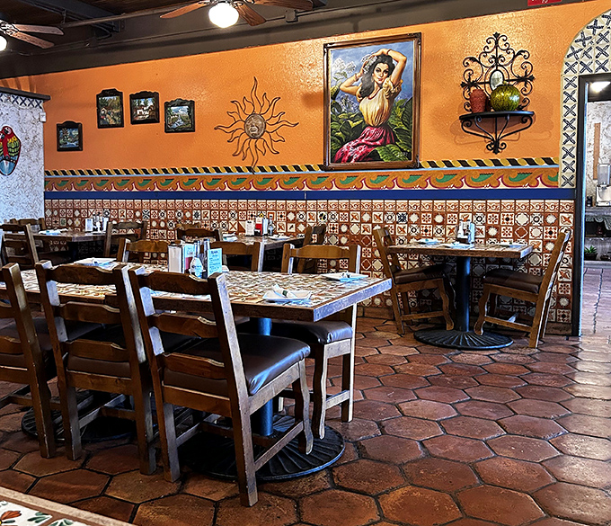 Warm orange walls, patterned tiles, and artwork that transports you south of the border. The only thing missing is a mariachi band serenading your enchiladas.