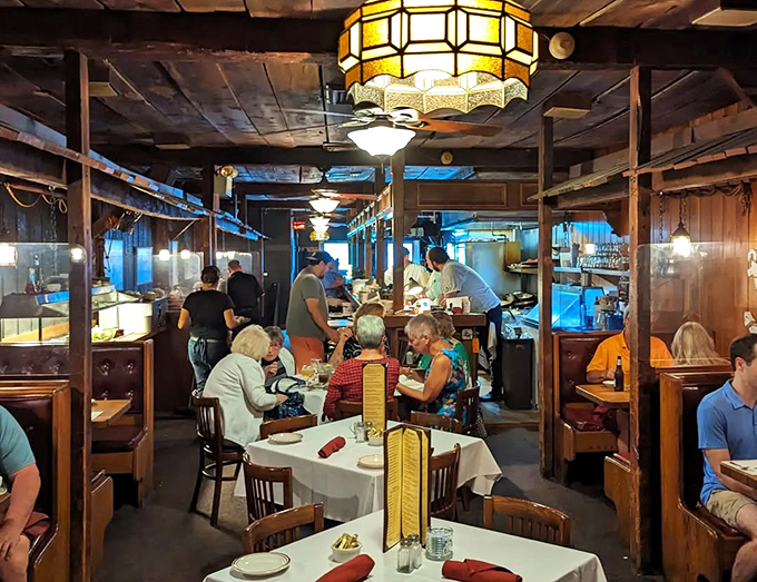 The dining room hums with conversation and clinking glasses—a symphony of satisfaction conducted by servers who move with practiced precision.