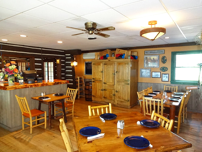 The dining room feels like the cabin you wish your family owned&mdash;warm wood tones, blue plates, and the promise of comfort food.