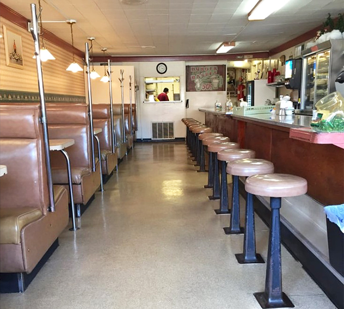 The counter where solo diners never feel alone. These stools have supported the weight of working folks and their worries for generations.