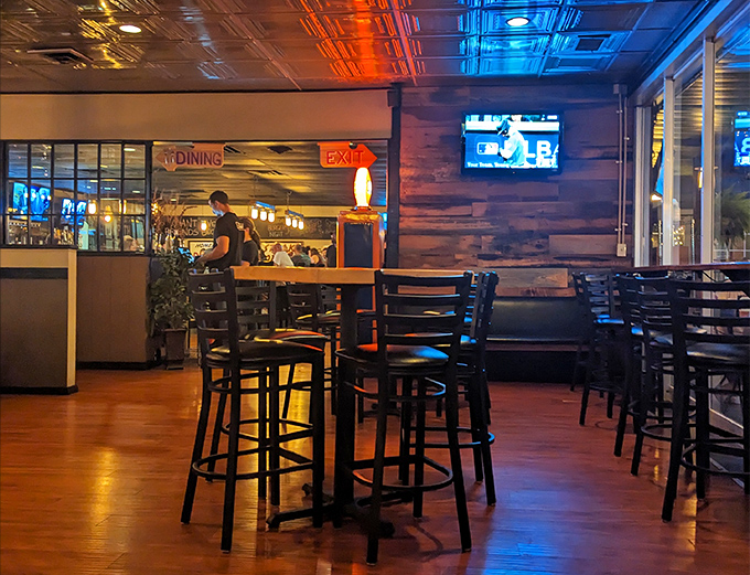 High-top tables await the after-work crowd. The neon "EXIT" sign isn't fooling anyone&mdash;once you're here, you won't want to leave.