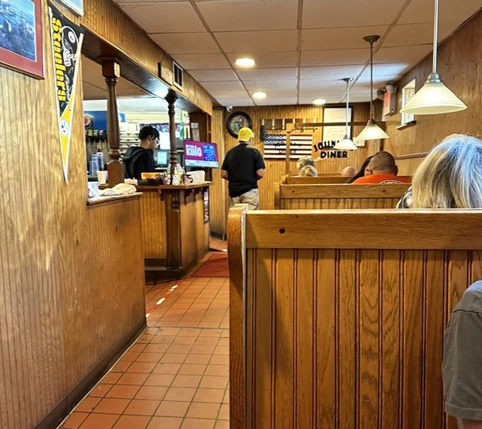 Wood paneling and booth seating &ndash; where comfort food meets comfortable seating in perfect diner harmony.