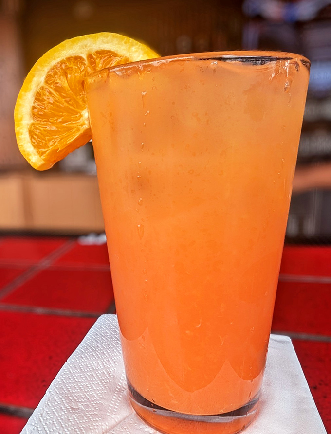 A sunset in a glass! This vibrant orange cocktail with its citrus garnish is what California dreams are made of&mdash;refreshing, bright, and ready for your Instagram.