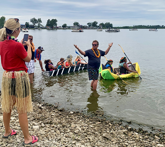 Nothing says "summer fun" like a homemade boat race with tropical flair. Competitive spirit meets Midwest ingenuity on the shores of Big Lake.