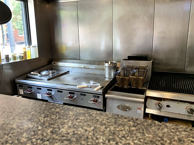 The well-seasoned flat-top grill&mdash;where cheesesteak magic happens daily. Those aren't just cooking surfaces; they're flavor-building platforms.