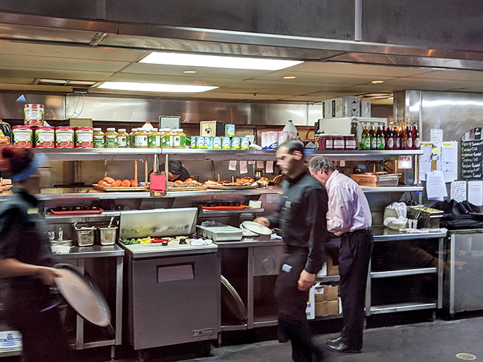 Behind the scenes, culinary wizards transform raw ingredients into the magic that keeps people coming back. The real Alamo battlefield is this kitchen.
