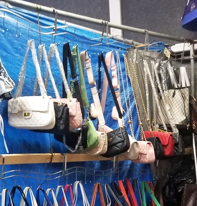 Handbags suspended like fashionable fruit, ripe for the picking. Designer-inspired without designer prices&mdash;the sweet spot of flea market fashion.