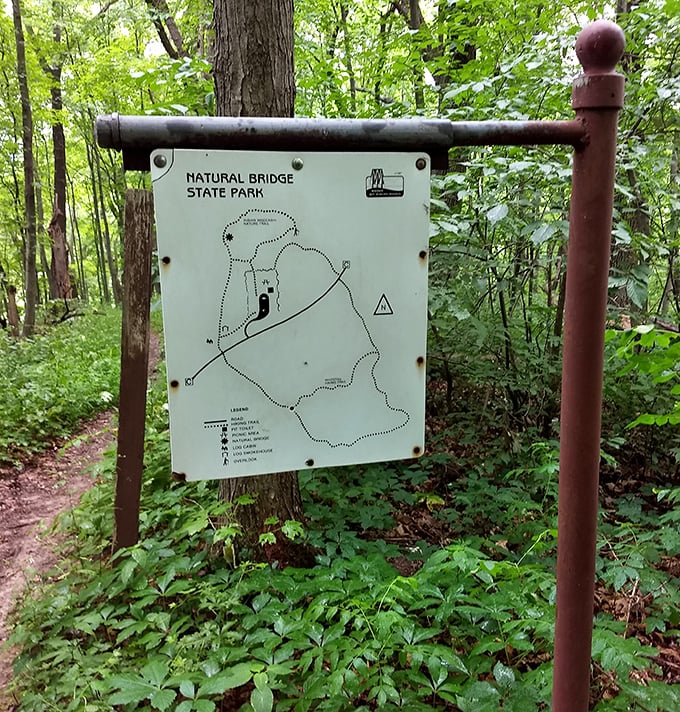 "You are here" &ndash; at the crossroads of geological wonder. This weathered trail map has guided countless explorers to Wisconsin's natural marvel.