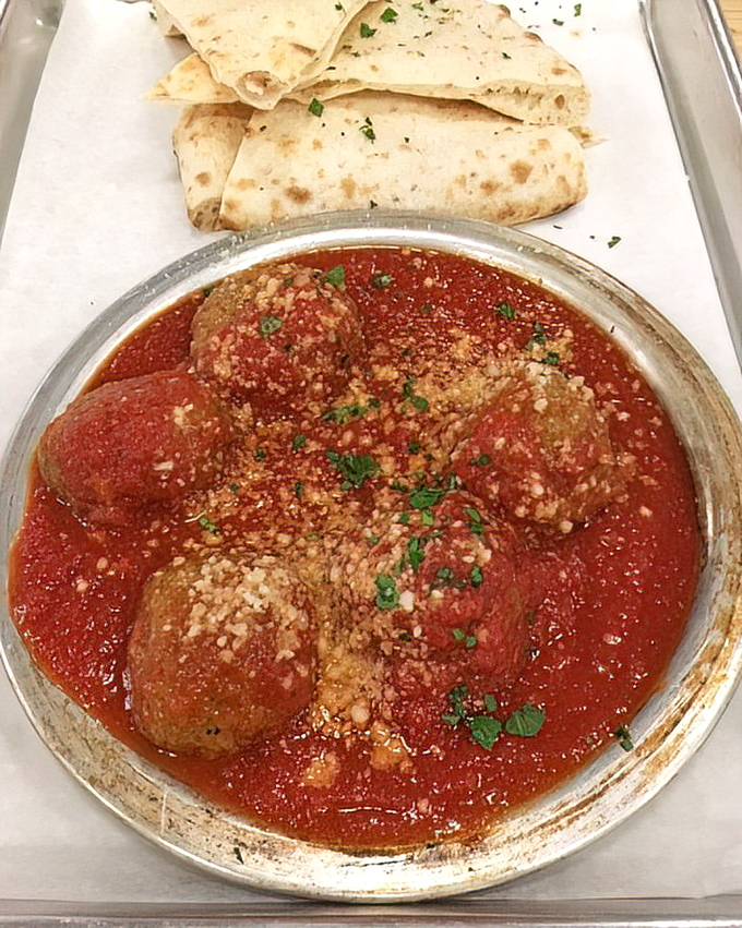 These meatballs don't just sit in sauce&mdash;they luxuriate in it, waiting for you to tear off a piece of bread and create the perfect bite.