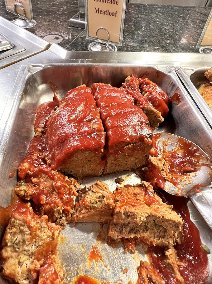 Homemade meatloaf under a blanket of tangy sauce&mdash;comfort food that transports you straight to Sunday dinner at your favorite aunt's house.